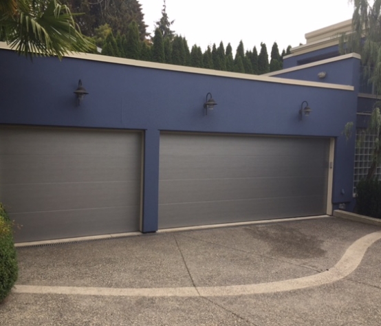 Clopay Modern garage Door/ Model 4138 in black - Access Garage Doors